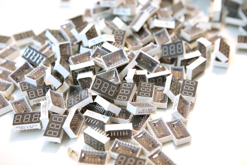 Lots of Radios. Loose Electronic Parts on the Table. Digital Indicator ...