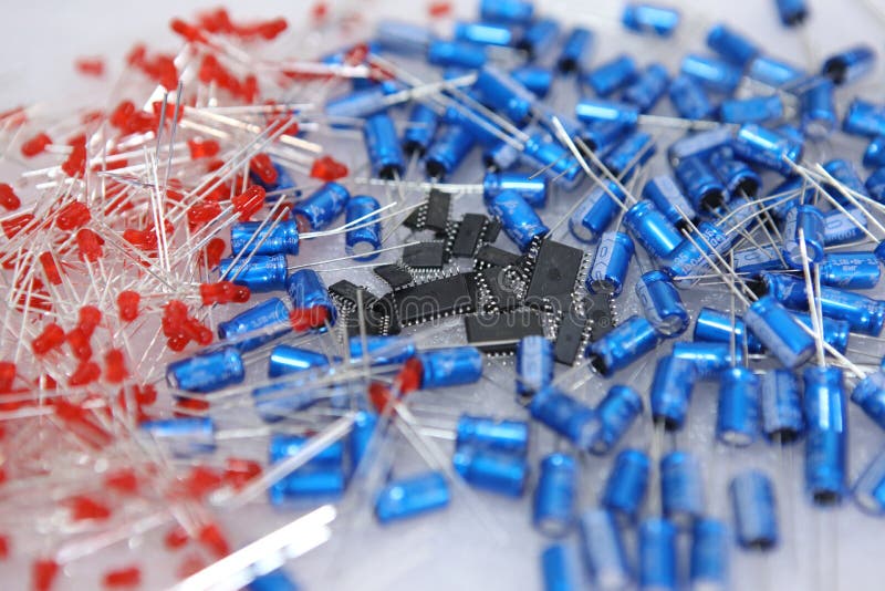 Lots of Radios. Loose Electronic Parts on the Table. Digital Indicator ...