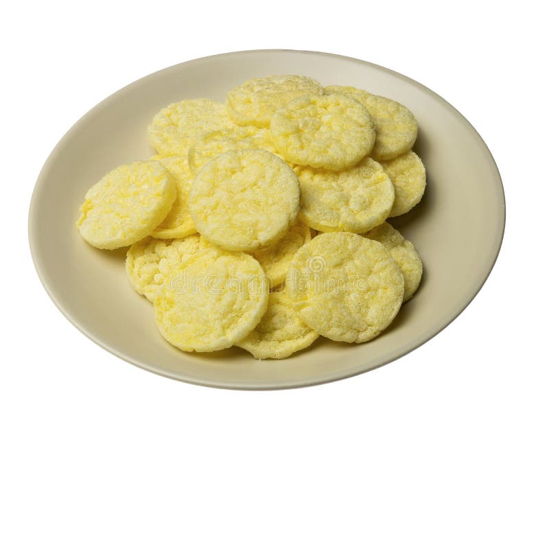 Lots of Round Rice Chips with Cheese Flavor on the Plate Stock Photo ...