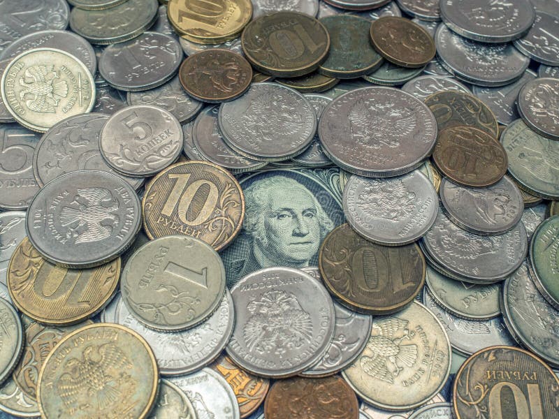 Lots of Russian Coins Stacked on Top of a Dollar. Background, Close-up ...