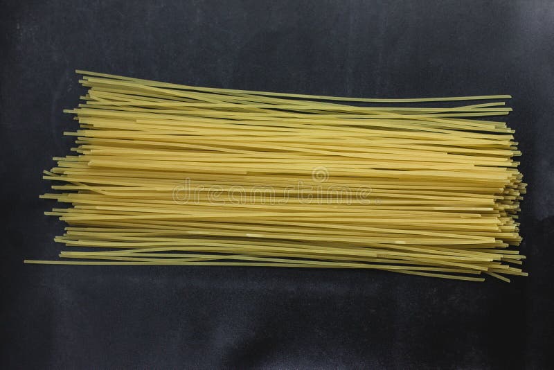 Lots Of Spaghetti On Black Background Stock Image - Image of background ...