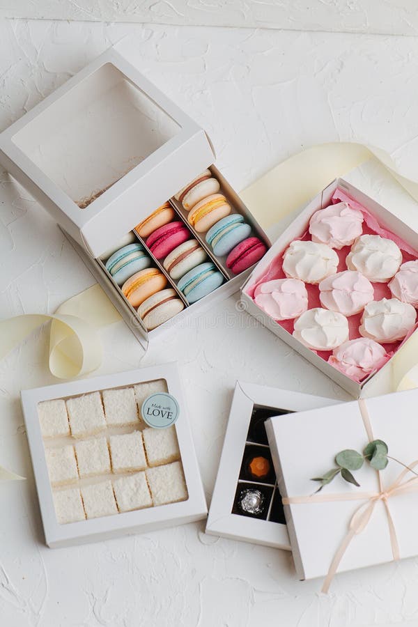 Lots of Sweets in Square Boxes. Macarons, Turkish Delight, Zefir ...