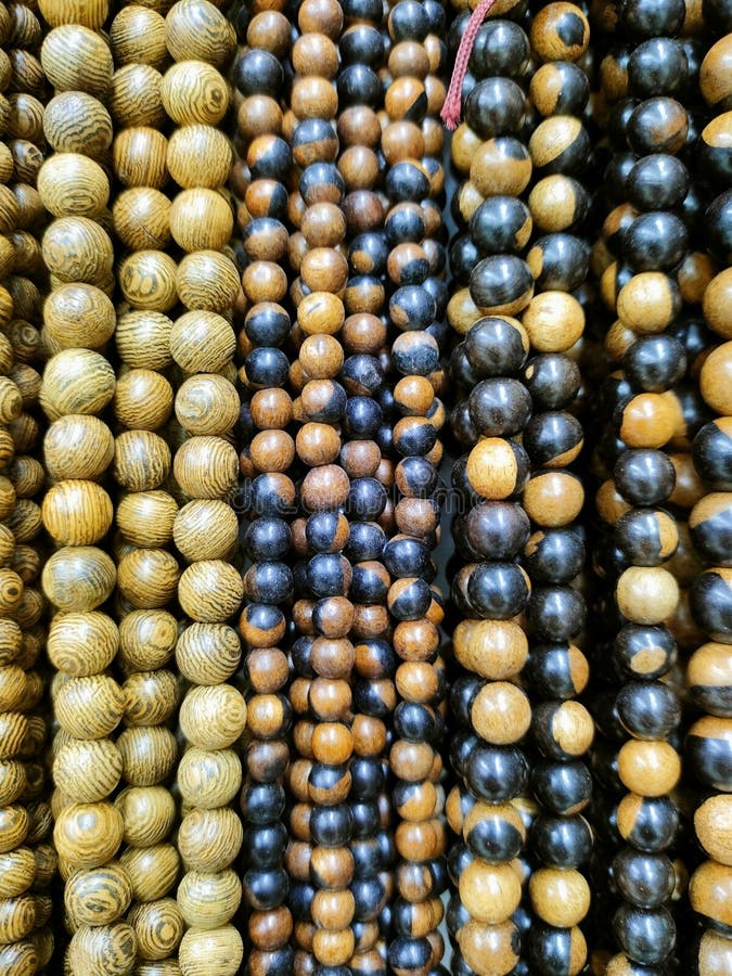 Lots of Threads with Wooden Beads Hanging in Rows on the Wall Stock ...