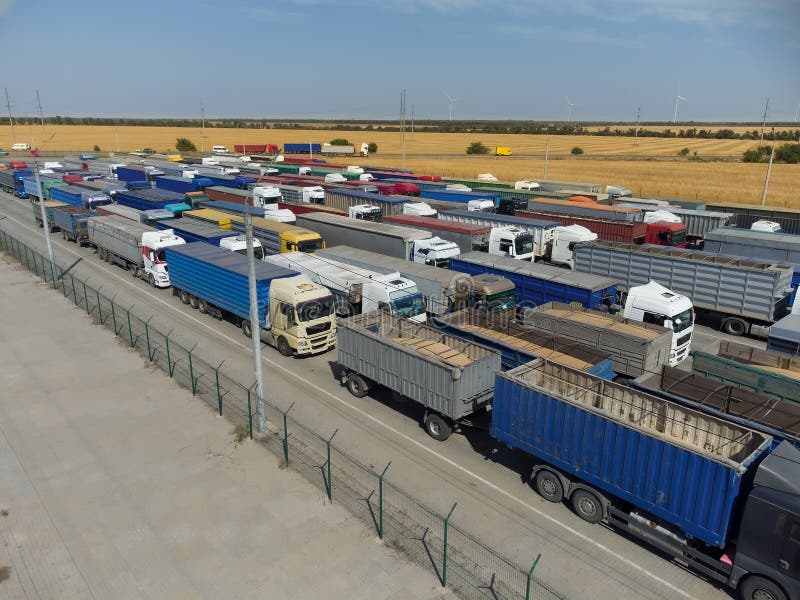 Lots of Trucks with Trailers in the Parking Lot. Queue for Unloading at ...