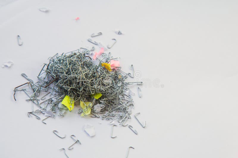 Lots of Used Staples Piled Up on White Paper with Blank for Copy Space ...