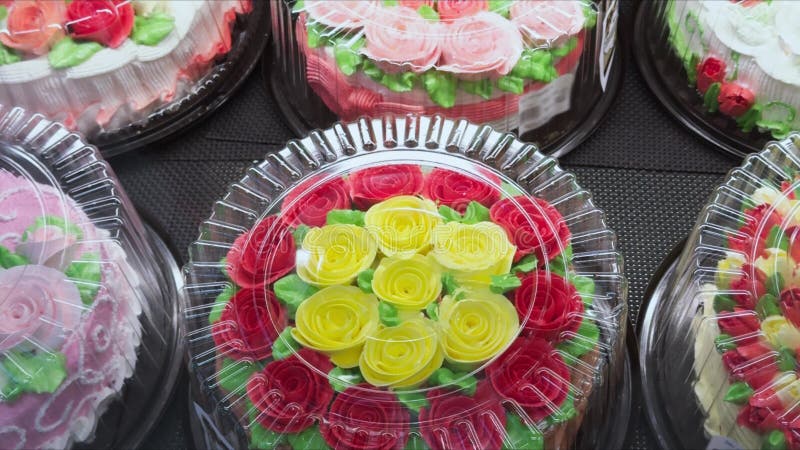 Lots of Variously Decorated Birthday Cakes on Display Stock Footage ...