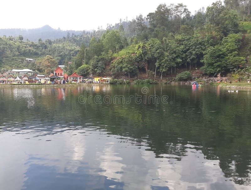 Lots of Water and Buildings Trees and Hills Stock Image - Image of ...