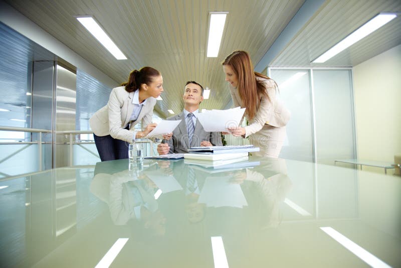 Boss and secretaries stock image. Image of employee, paper - 32048359