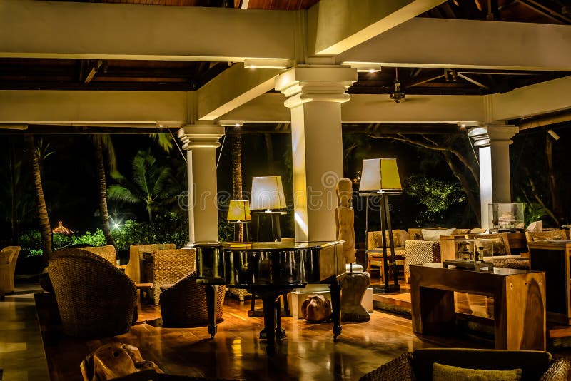 Lounge Bar Interior with Tables and Chairs and Couches at Night Stock ...