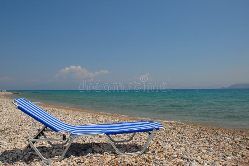Lounge chair at beach stock image. Image of bright, refreshing - 2862523
