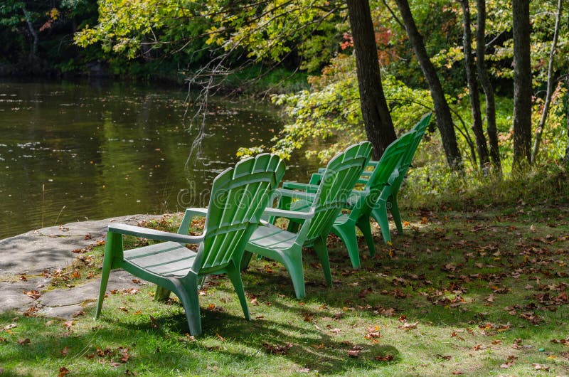 Lounge Chairs at the Lake stock image. Image of lake - 103543921