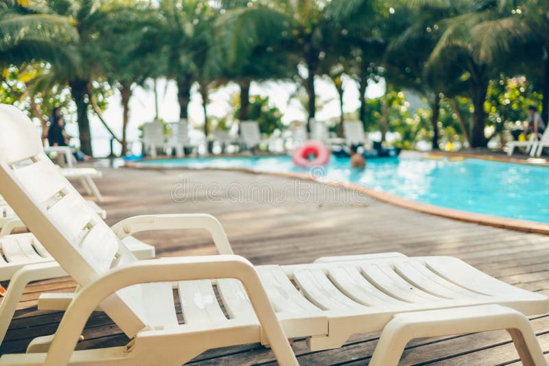 Lounge Chairs Near the Pool at the Hotel Stock Photo - Image of ...