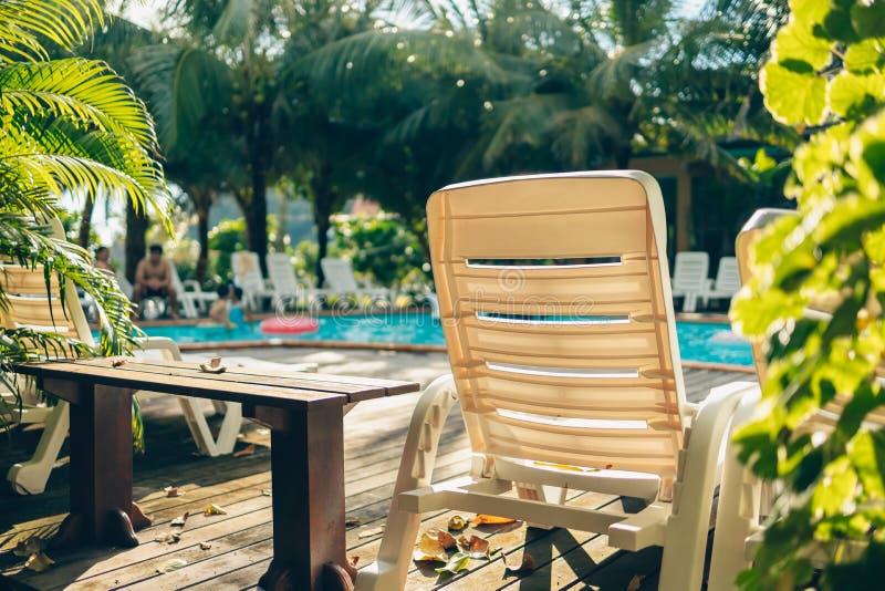 Lounge Chairs Near the Pool at the Hotel Stock Image - Image of summer ...