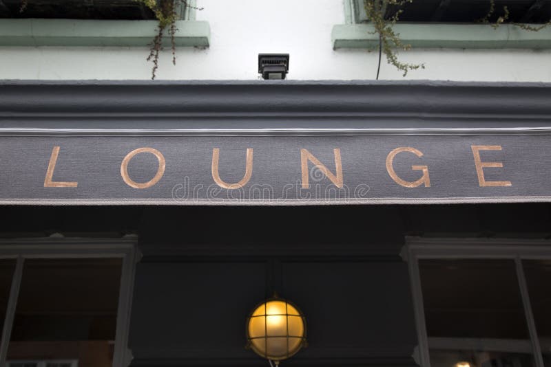 Lounge Sign on Facade editorial stock photo. Image of facade - 105511288