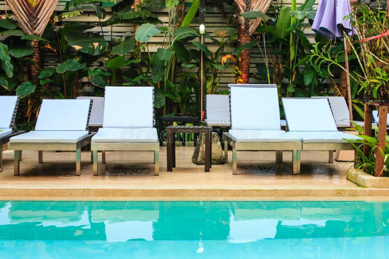 Lounge Sunbed in Swimming Pool Stock Photo - Image of summer, design ...