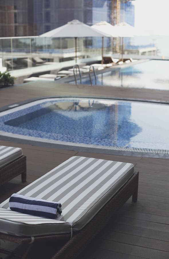 Lounge Sunbed in Swimming Pool Stock Image - Image of luxury, warm ...