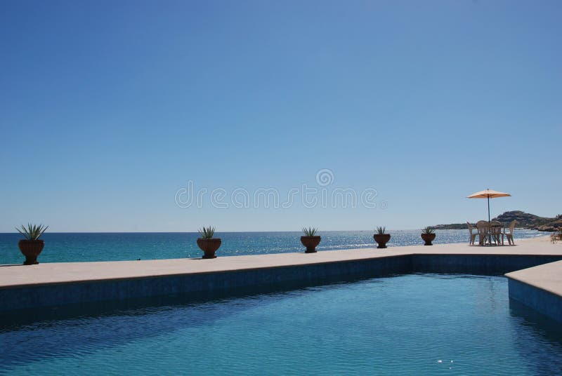 Lounging at the pool stock image. Image of cortez, view - 14342457