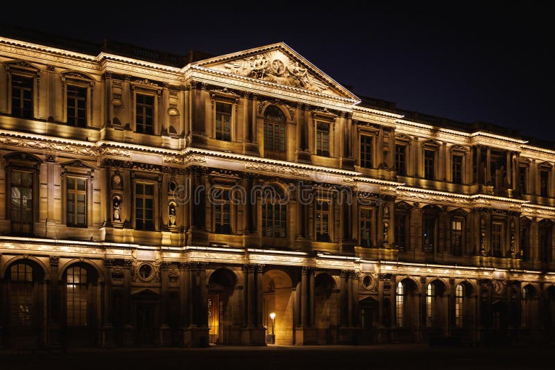 The Louvre Museum Building is Illuminated at Night Stock Photo - Image ...