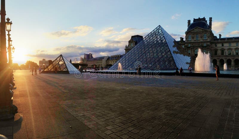 Louvre museum at sunset editorial photography. Image of courtyard ...