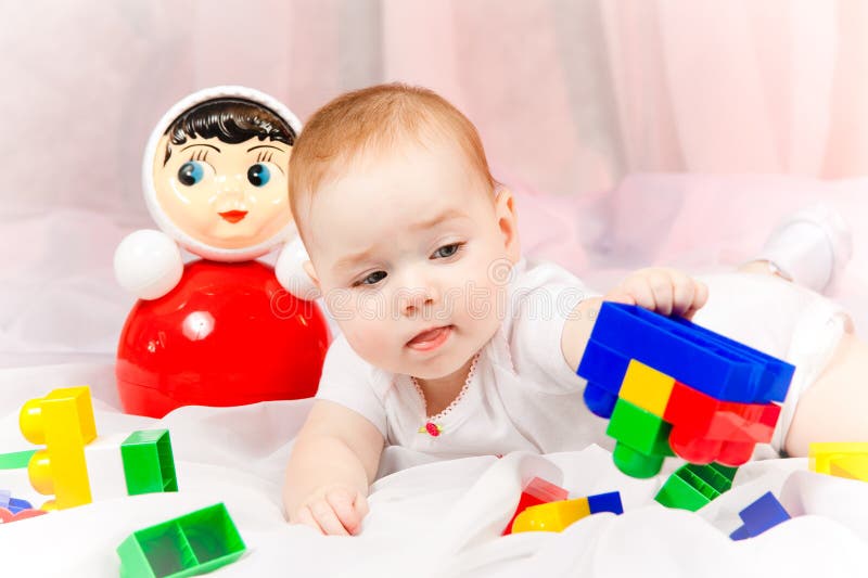 Lovable baby with toys stock photo. Image of little, beautiful - 35343340