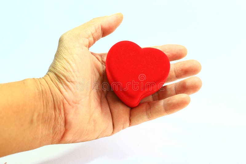 Helping Hand Concept, Man`s Hands Palms Up Holding a Red Heart, Giving ...