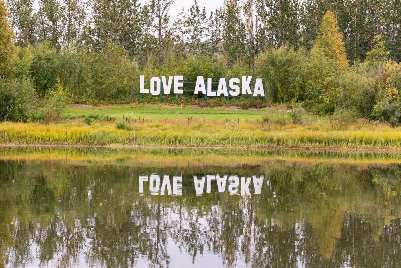 Love Alaska Sign Along the River Stock Image - Image of tourism ...