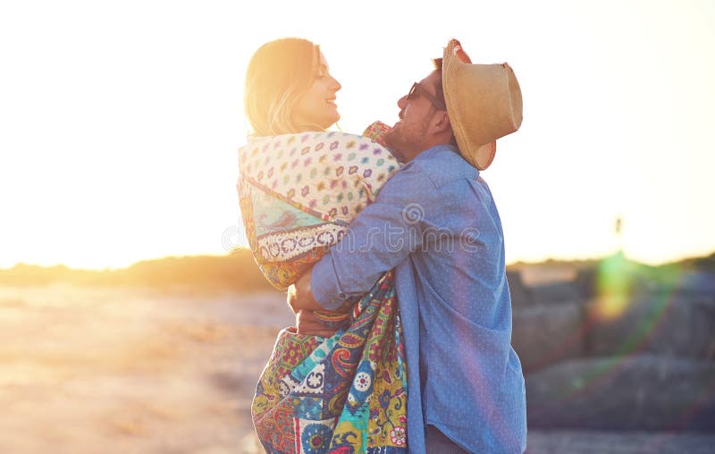 Love is a Big Cuddly Bear Hug. an Affectionate Young Couple at the ...