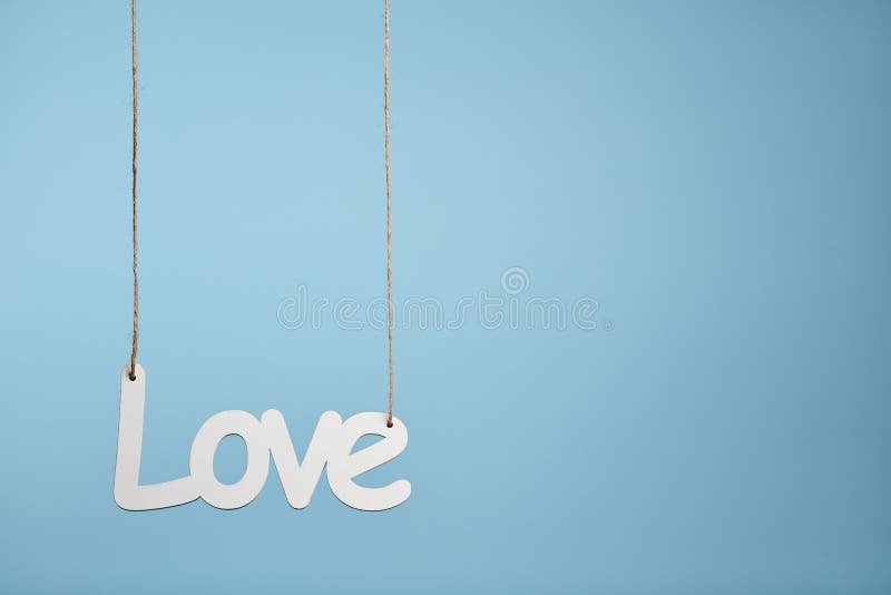 Love on blue background stock photo. Image of february - 84535510