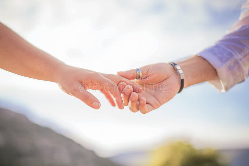 In Love Caressing Hand in Hand in Natura Stock Photo - Image of ...