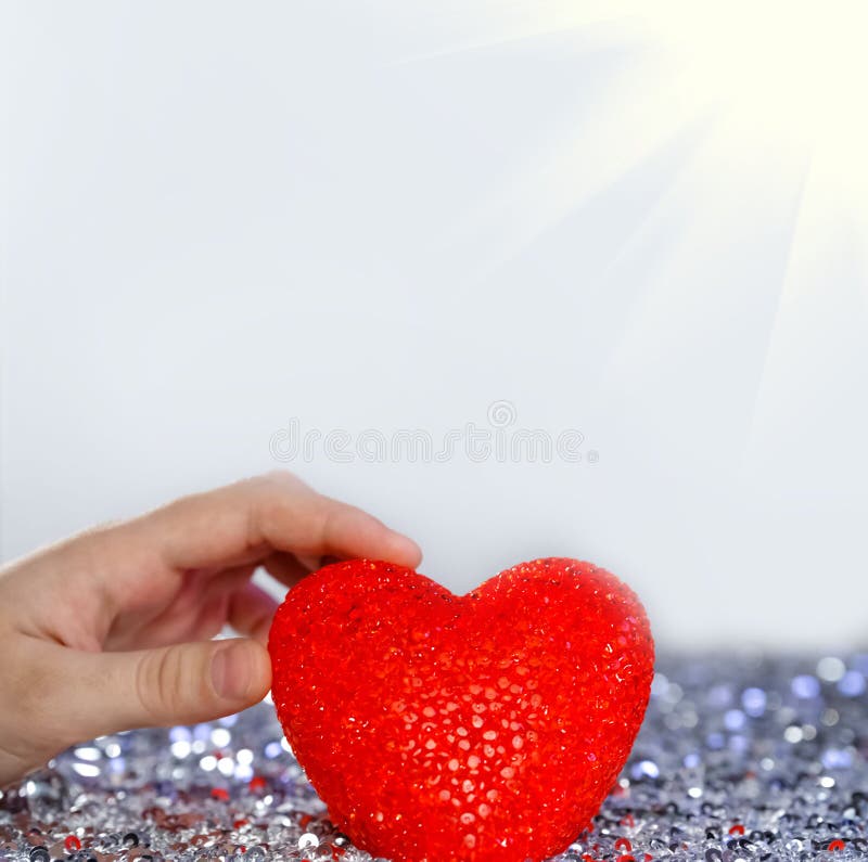 Love Concept. the Hand Touches the Heart. the Shape of the Heart. Sun ...