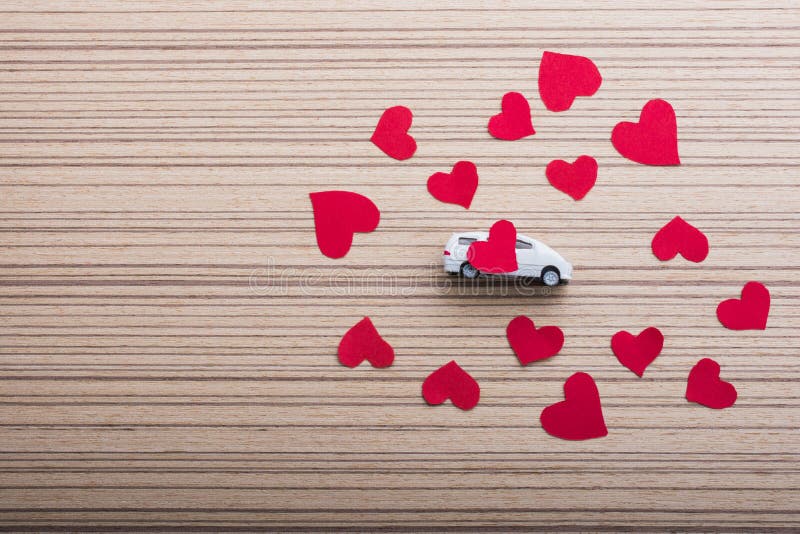 Love Concept with Car and Heart Shaped Papers Stock Image - Image of ...