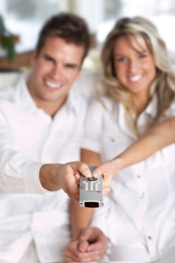 Love Couple with TV Remote Control Stock Photo - Image of apartment ...