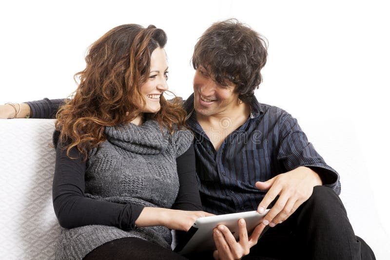 In Love Couple Using a Tablet Computer Stock Image - Image of women ...