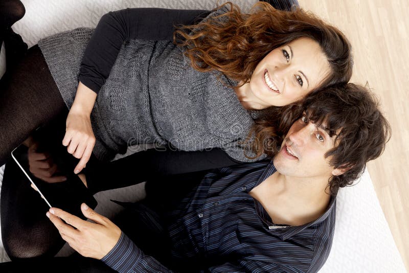 In Love Couple Using a Tablet Computer Stock Photo - Image of lifestyle ...