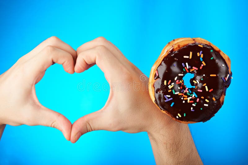 I Love Donuts Concept. Multi-colored Donut and White Heart on a Pink ...