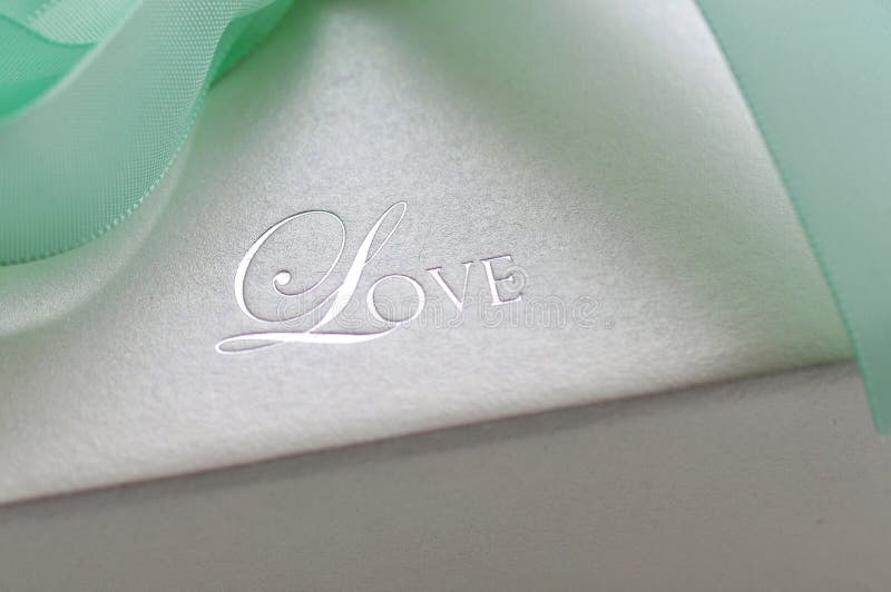 Love Embossing on Top of Gift Box Stock Image - Image of family, bands ...