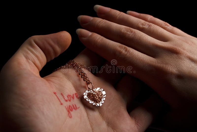 Love-favour with two hands stock photo. Image of coulomb - 12777838