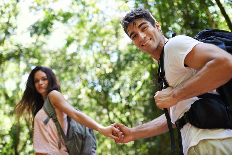 We Love Hiking Together. a Young Couple Hiking through the Forest ...
