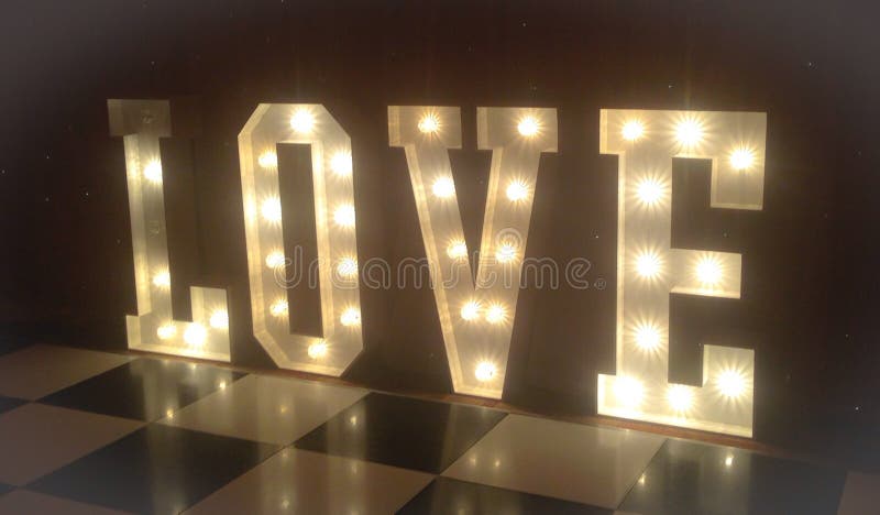 LOVE in Lights: Wedding Decorations Stock Image - Image of small, table ...