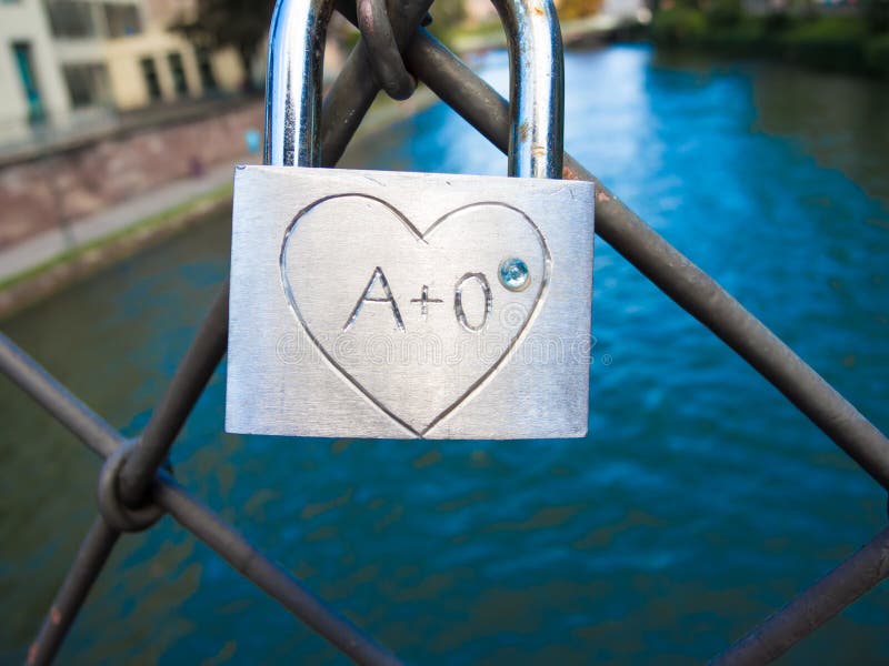 Love Lock As a Symbol of Love and Unity Hanging on a Bridge Railing ...