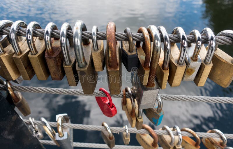 Love locks on wire editorial photo. Image of outdoors - 95644306