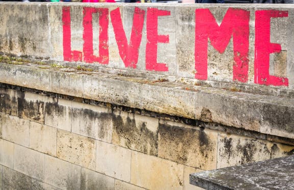 Love Me Message Written on the Wall Stock Image - Image of bridge ...