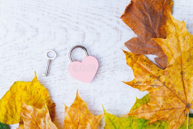 Love Message in Autumn Leaves. Clean Notebook and Heart-shaped Lock on ...