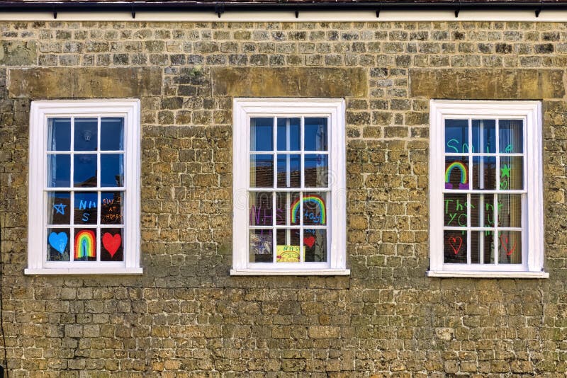 Love NHS & Rainbows of Hope Signs in the Windows of a House Editorial ...