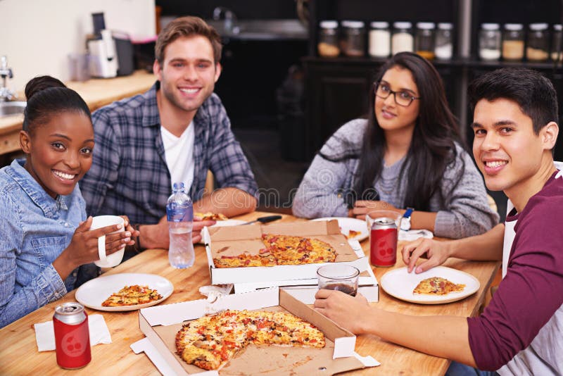 They Love Pizza. a Group of Friends Enjoying Pizza Together. Stock ...