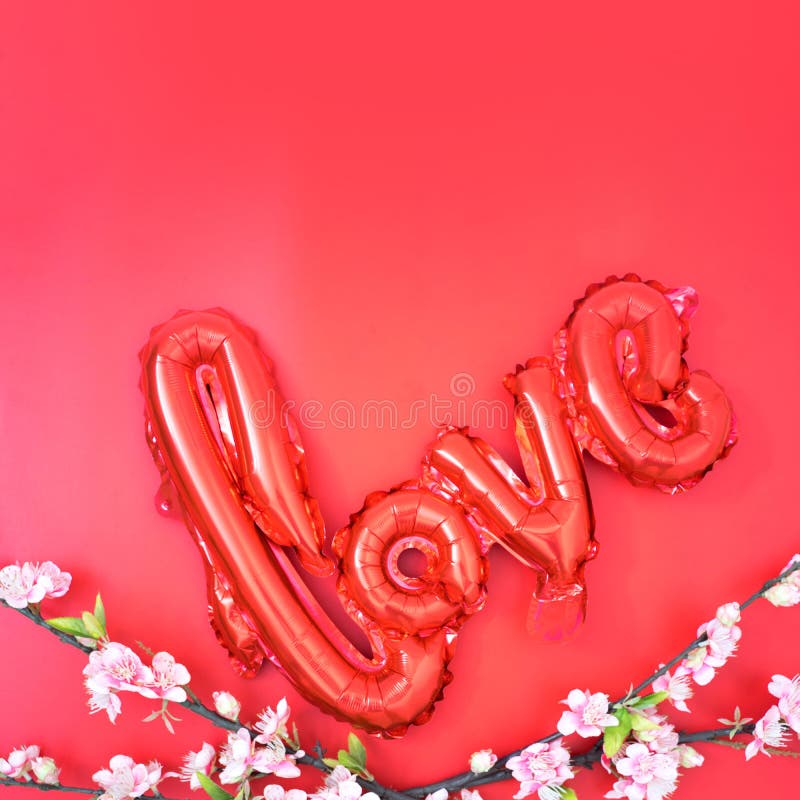 Love Red Foil Balloon with Pink Sakura on Red Stock Photo - Image of ...
