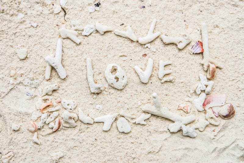 Love sign on beach stock photo. Image of graphic, background - 32314096