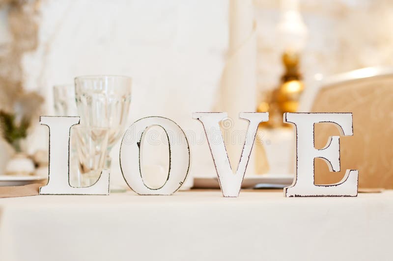 Love Sign on Table. Decor in Restaurant. Light Beige Stock Image ...