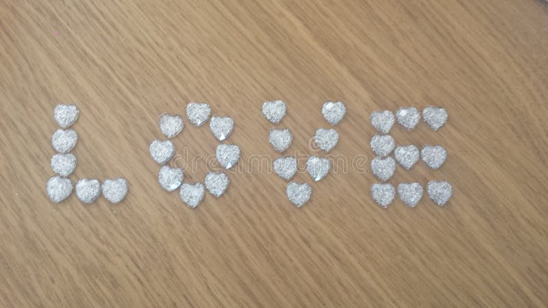 Love with silver hearts stock photo. Image of writing - 73918690