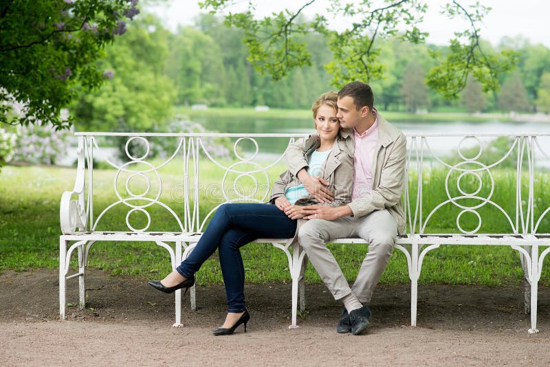 Love Story, Young Couple on Bench. Romance Relationship Stock Photo ...